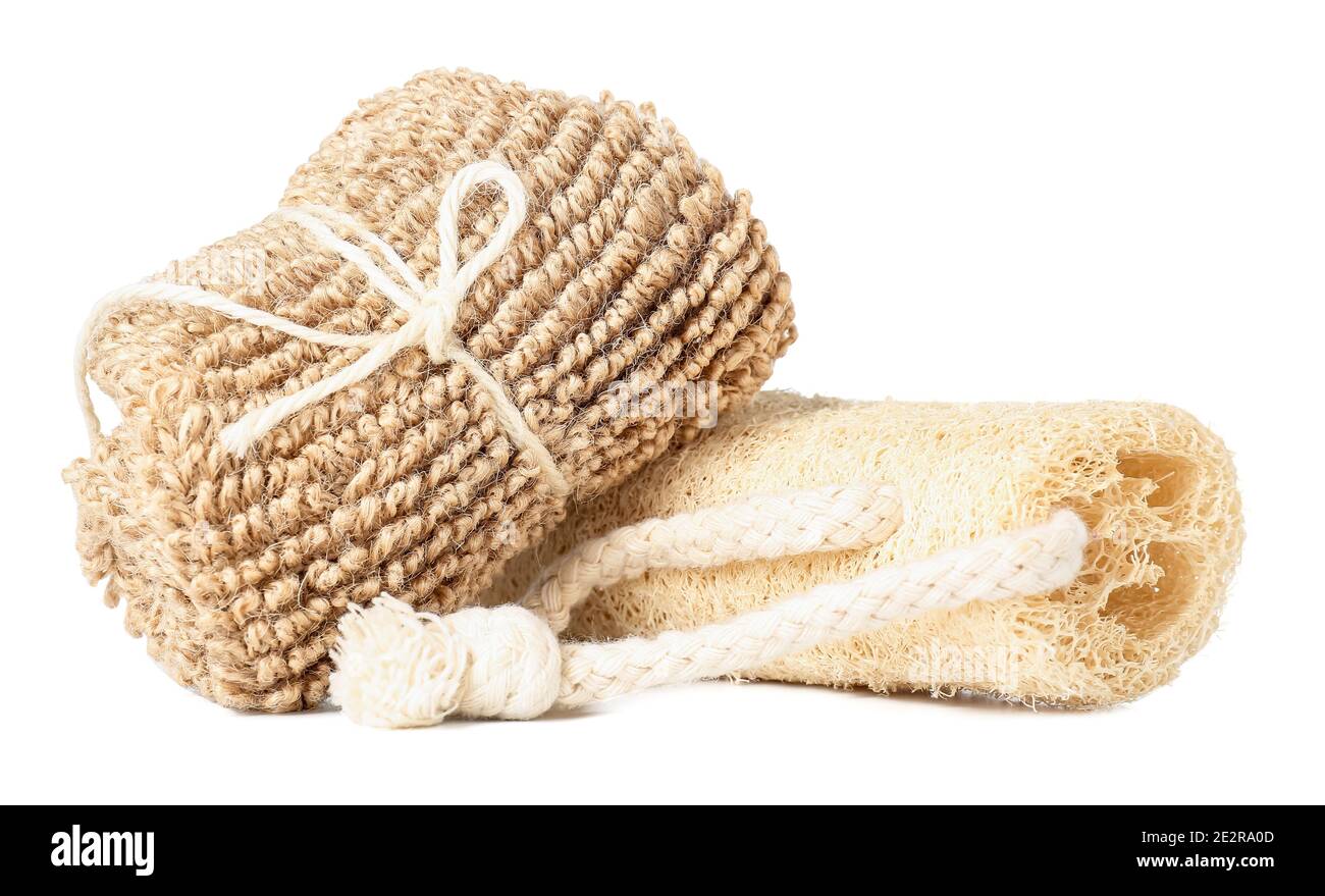 Different loofahs isolated on white background Stock Photo - Alamy