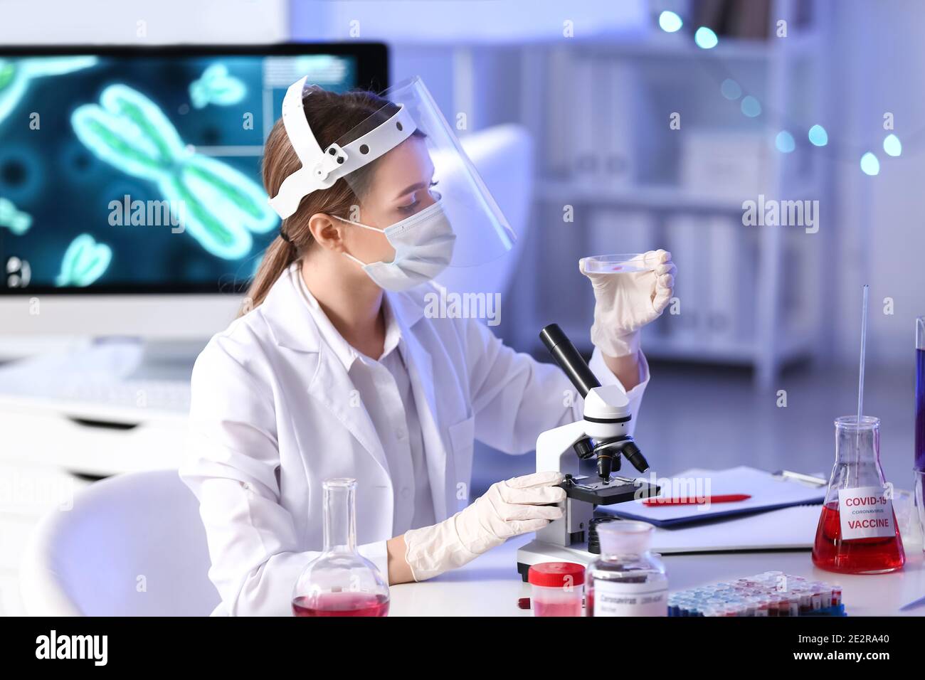 Scientist working with sample in laboratory Stock Photo - Alamy