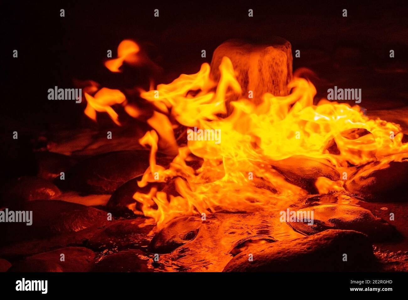 Spring of fire water. Burning methane in water. Cold fire Stock Photo ...