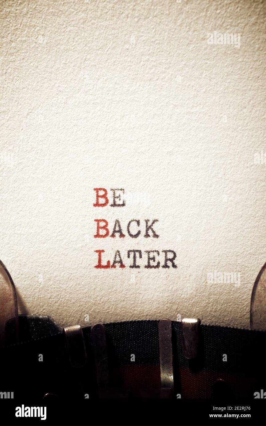 Be back later phrase written with a typewriter Stock Photo - Alamy