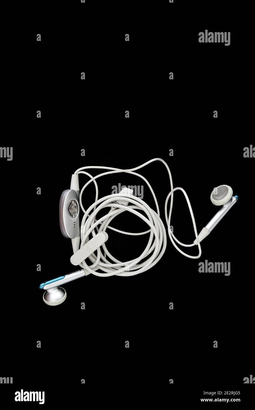 Earbuds (wired, not wireless) hi-res stock photography and images - Alamy