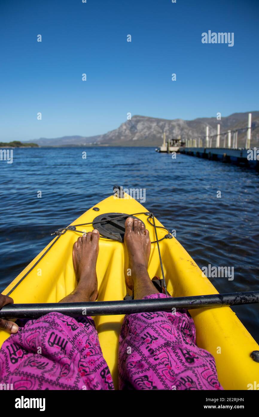 Yellow kayak on the lake Stock Photo - Alamy