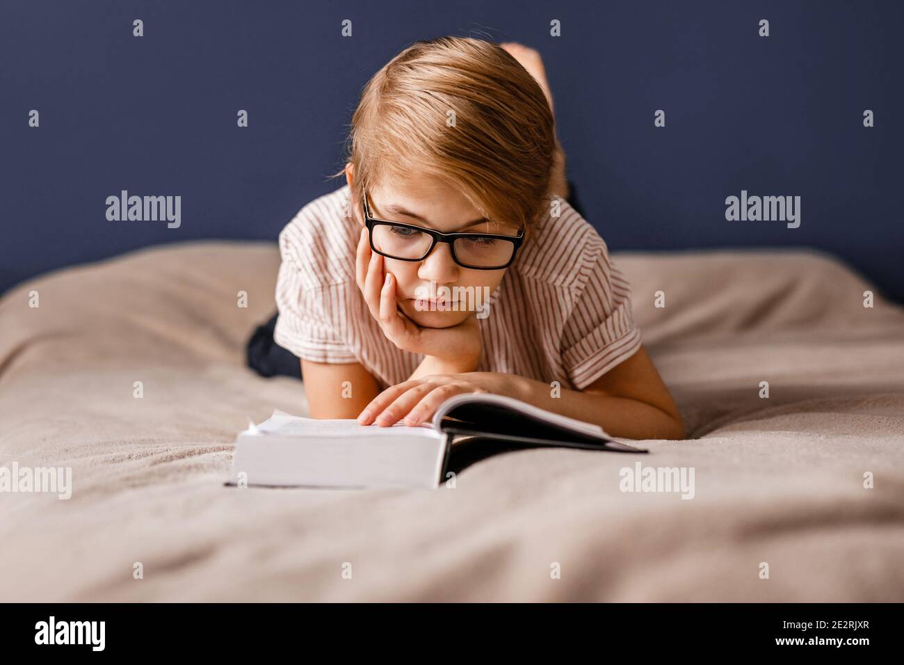 10 Year Old Reading A Book High Resolution Stock Photography and Images ...