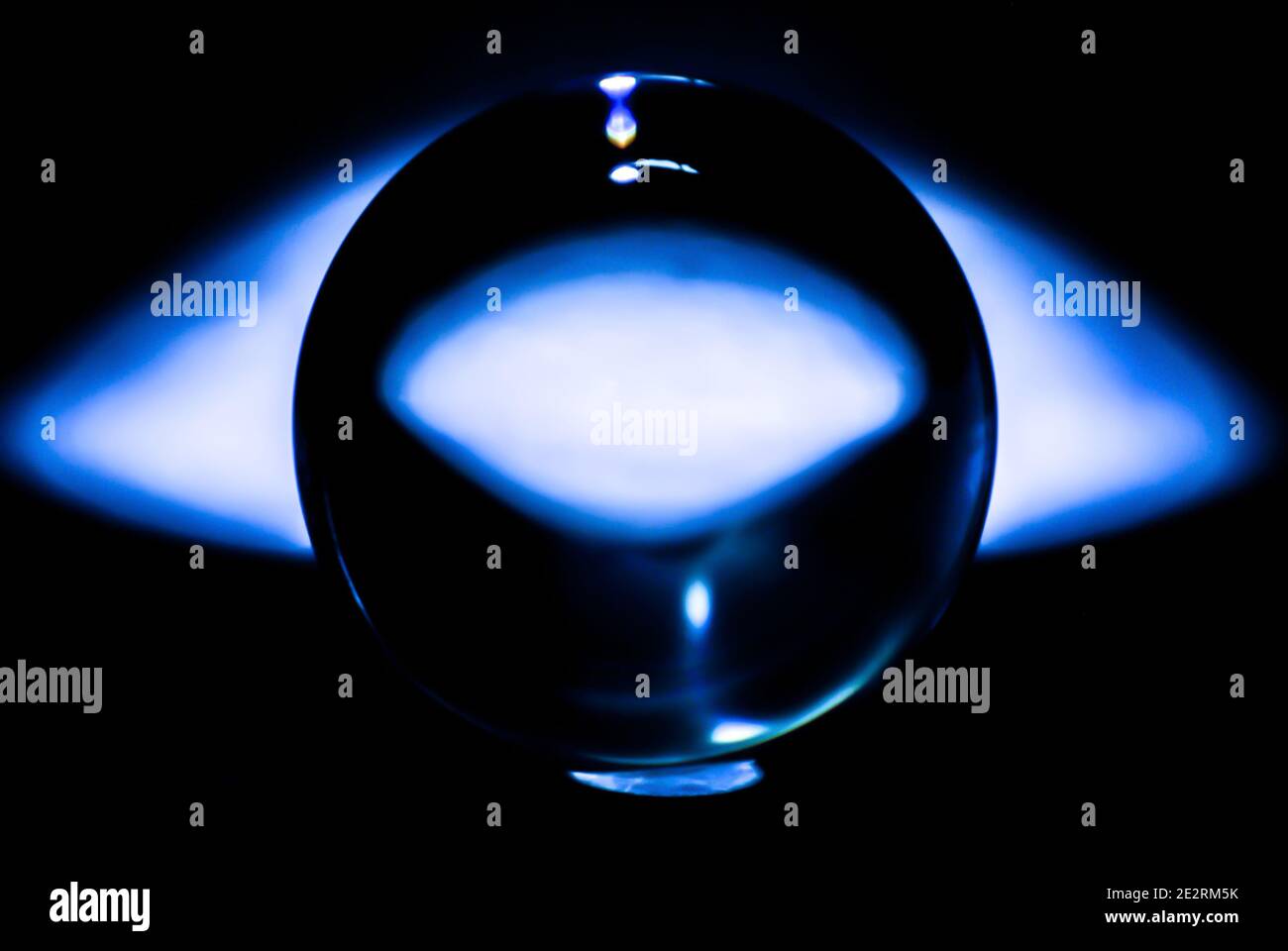 Abstract glass ball in blue. Glass ball in abstract blue light Stock ...