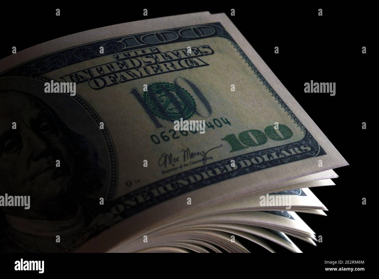 USD banknotes isolated on black background Stock Photo - Alamy