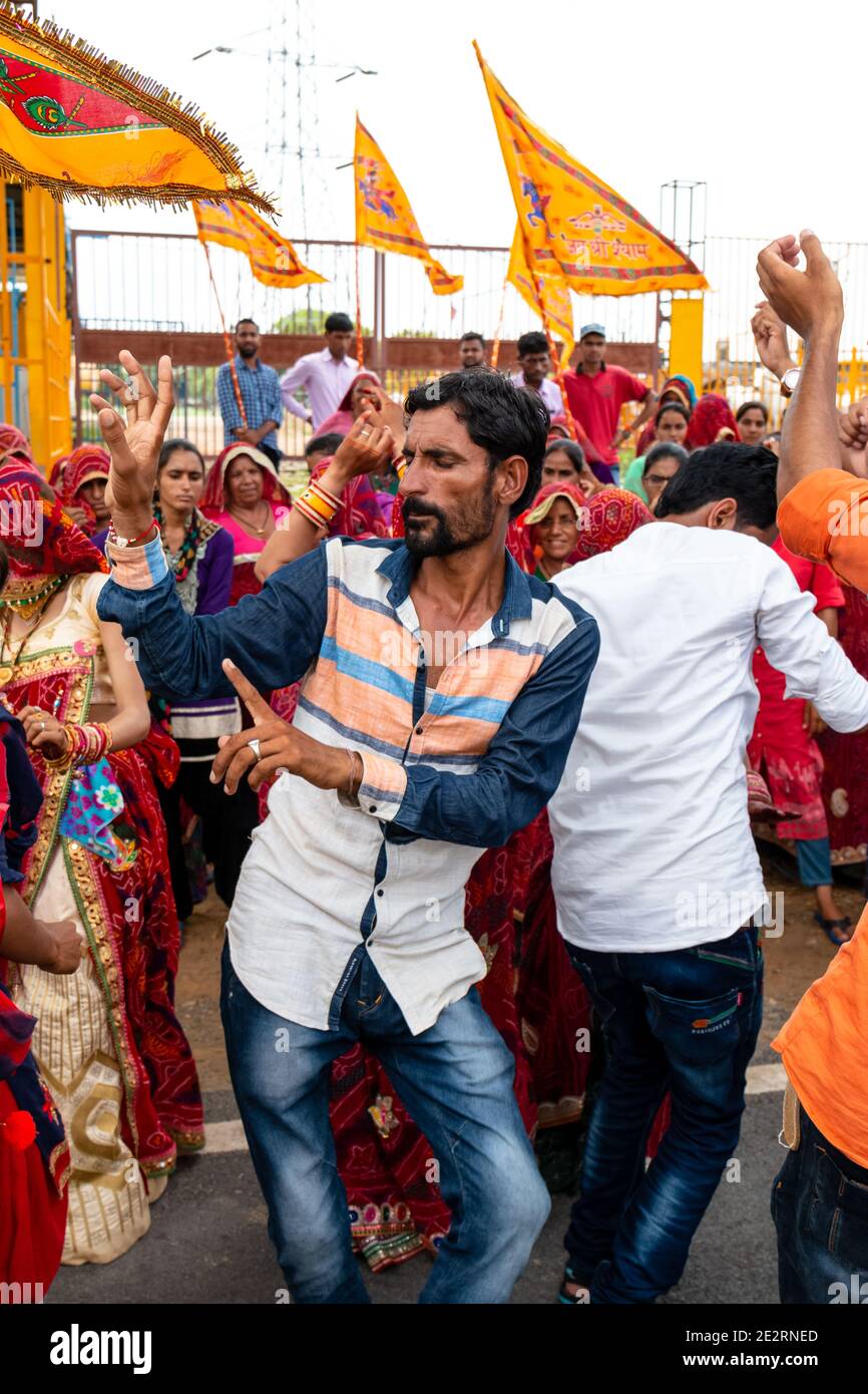 Indian People participating in Holy parade march during monsoon season ...