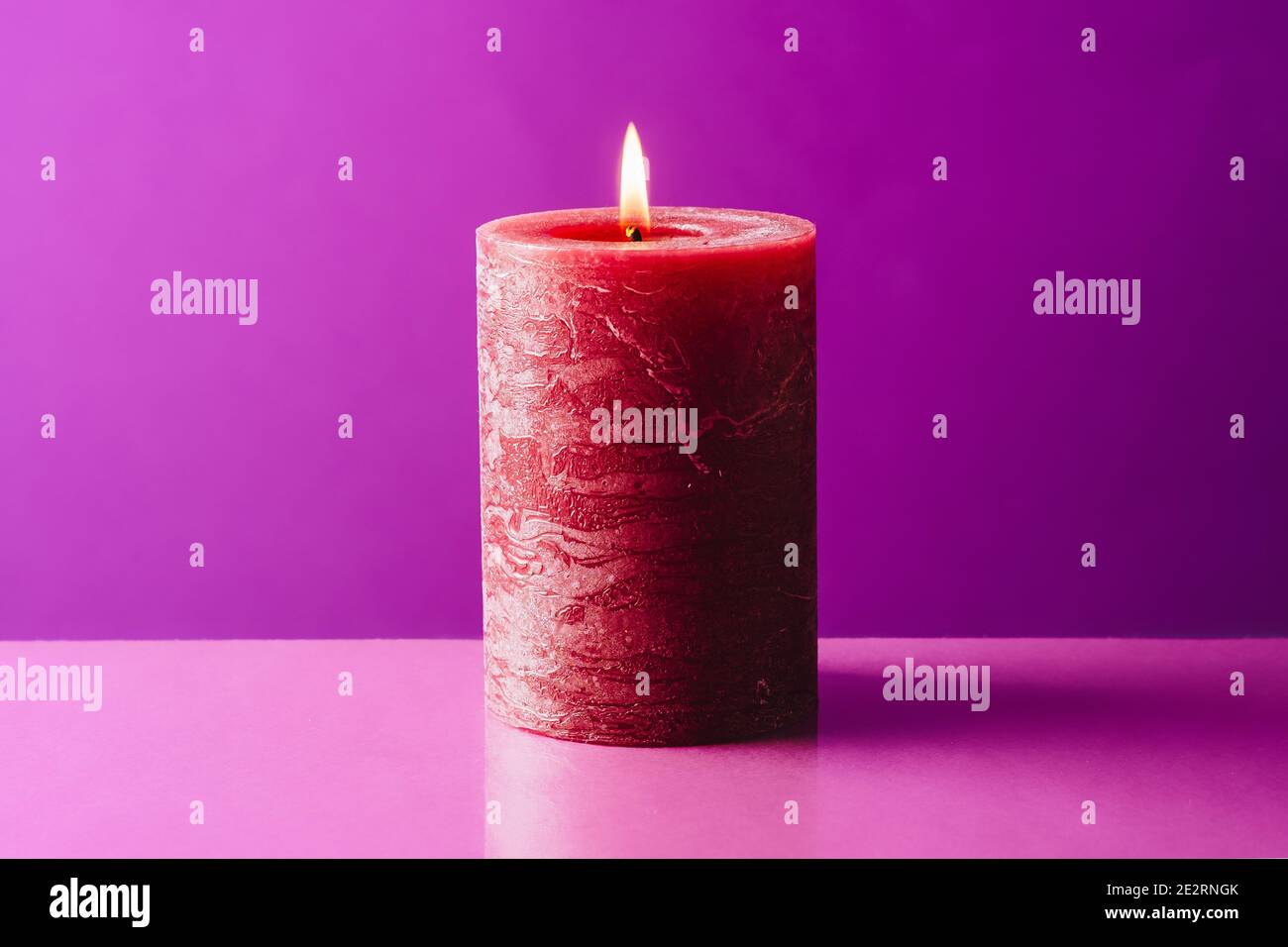 Purple candle with flame hi-res stock photography and images - Alamy