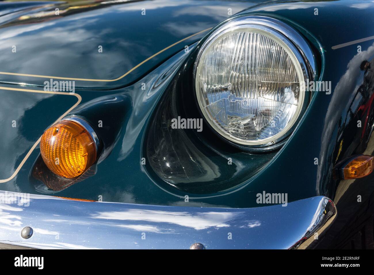 Close up detail of the headlight, bumper and bonnet on a 1972 British ...
