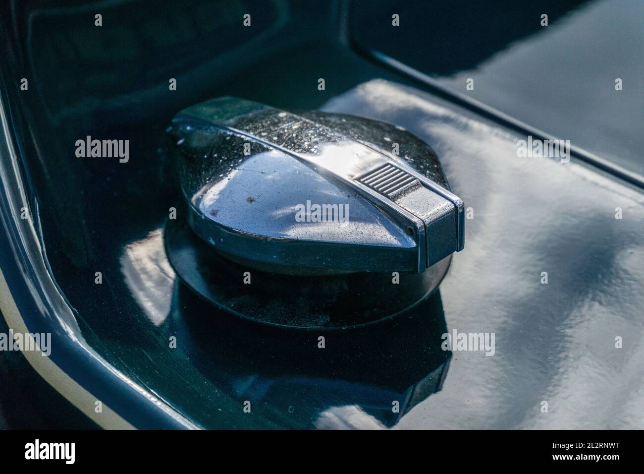 Close up detail of the fuel filler cap on a 1972 British racing green ...
