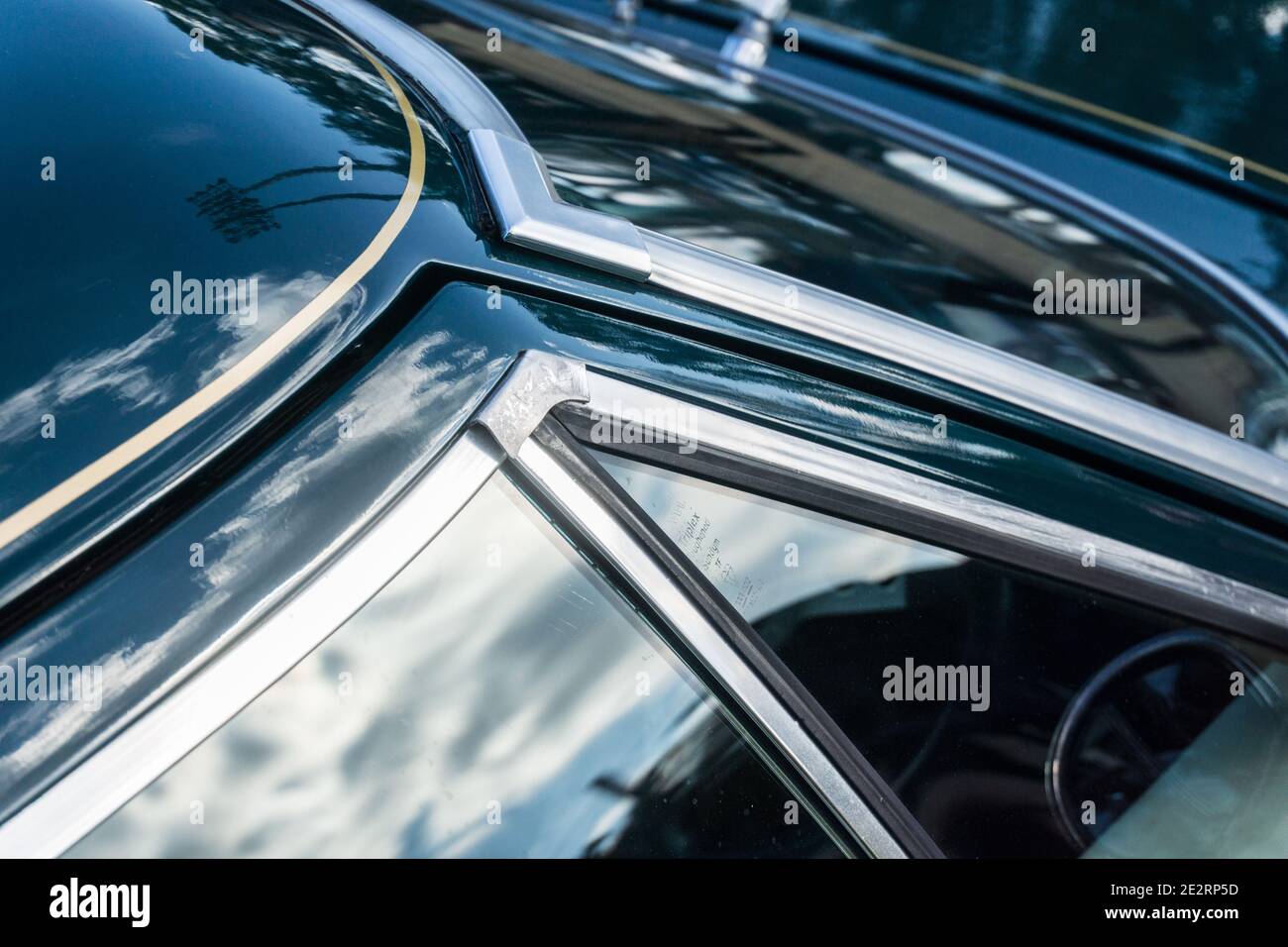 Close up detail of the driver's door window on a 1972 British racing ...