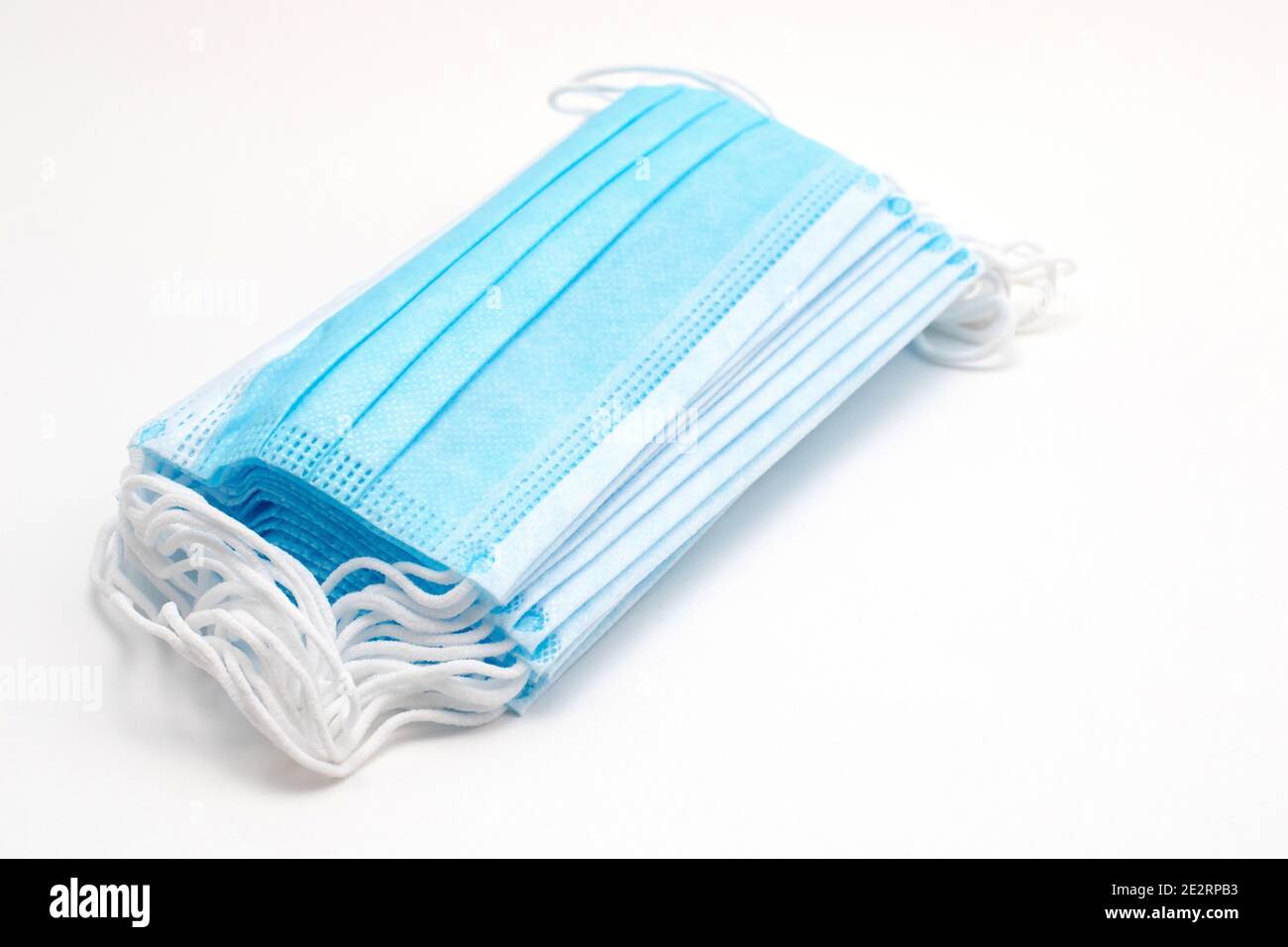 Stack of surgical medical face mask for protection on white background ...