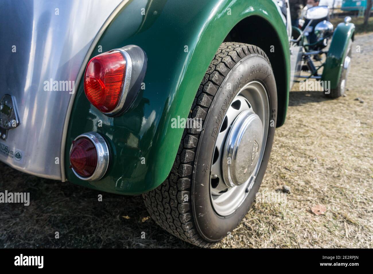 Close up detail of the rear wheel and arch of a British racing green ...