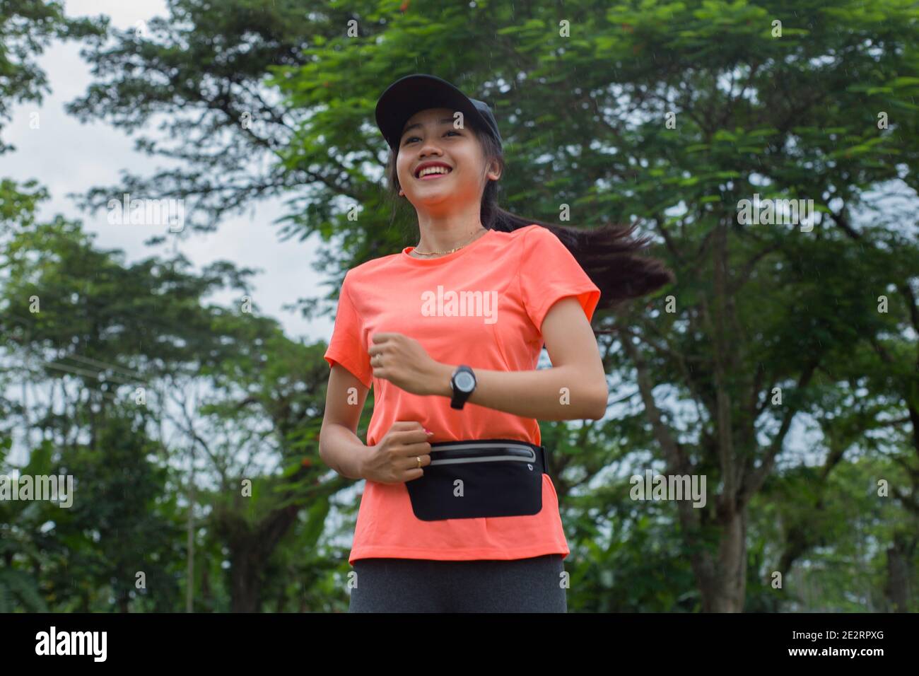 Girl doing excercise in park hi-res stock photography and images - Alamy