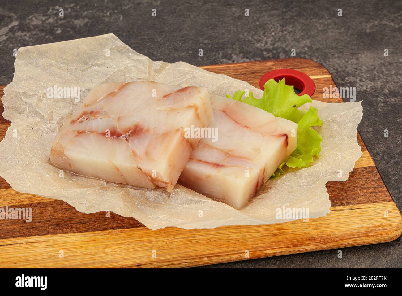 Raw dietary pollock fish fillet for cooking Stock Photo - Alamy