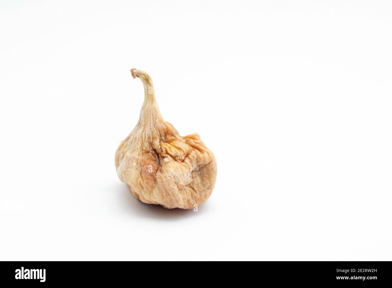 Dried one figs fruit isolated on white background Stock Photo - Alamy