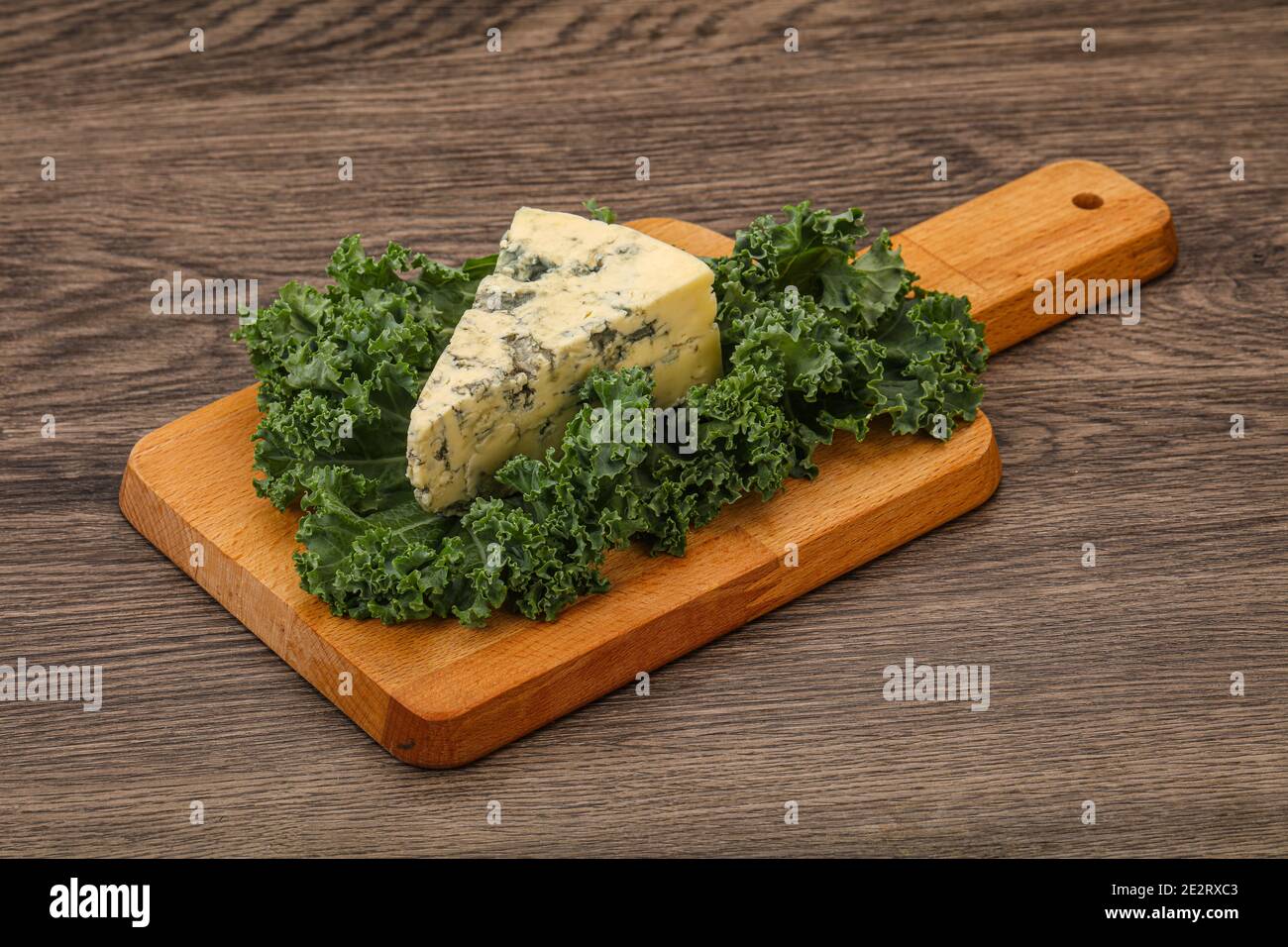 Dairy Blue cheese triangle with mold Stock Photo - Alamy