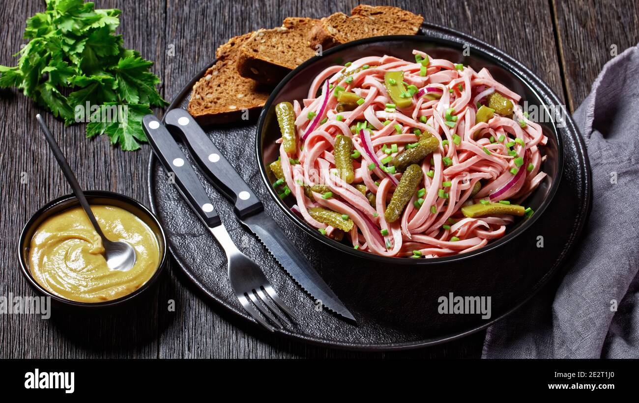 German wurstsalat of cooked german lyoner sausage with pickled ...