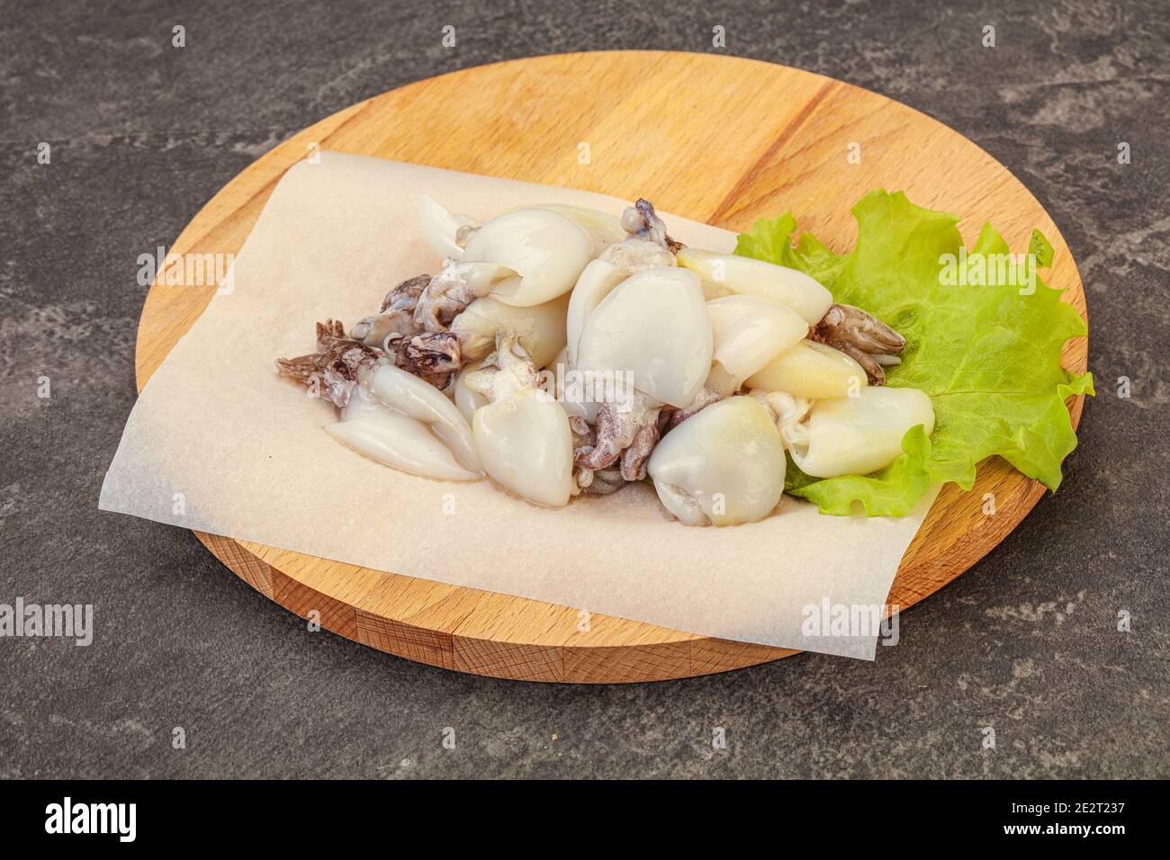 Raw seafood - cuttlefish for cooking over board Stock Photo - Alamy