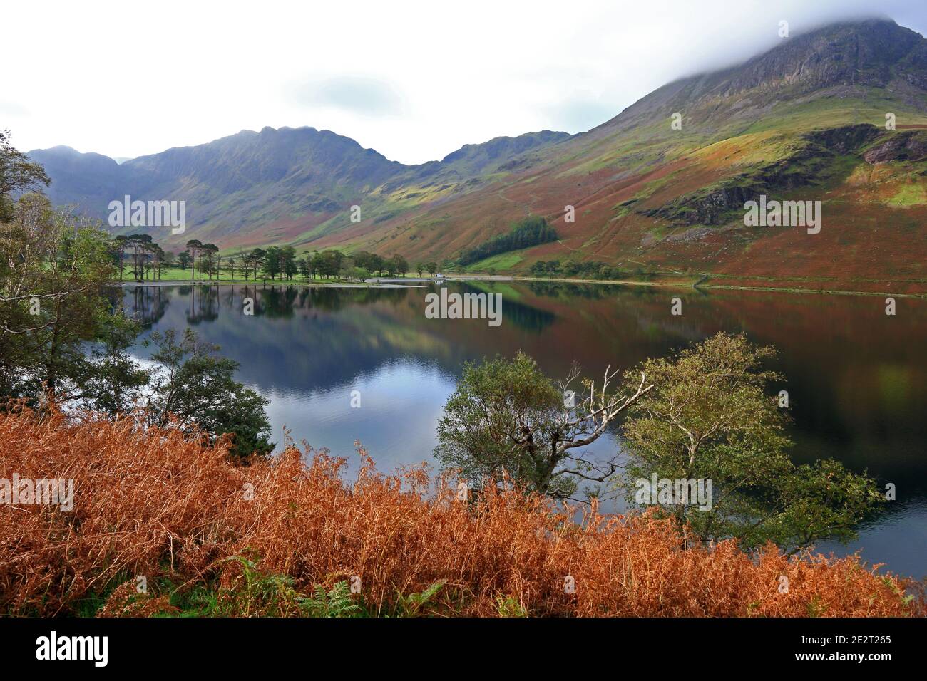 Buttermere overshadowed by High Stile and High Crag Stock Photo - Alamy