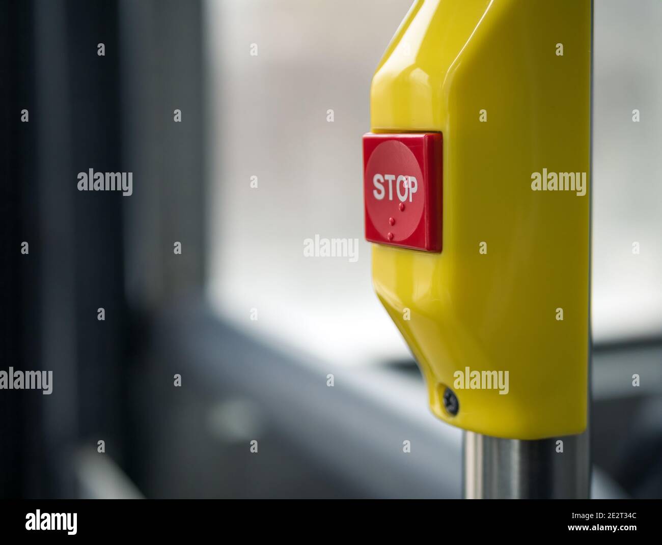 Red stop button in the public buses Stock Photo - Alamy