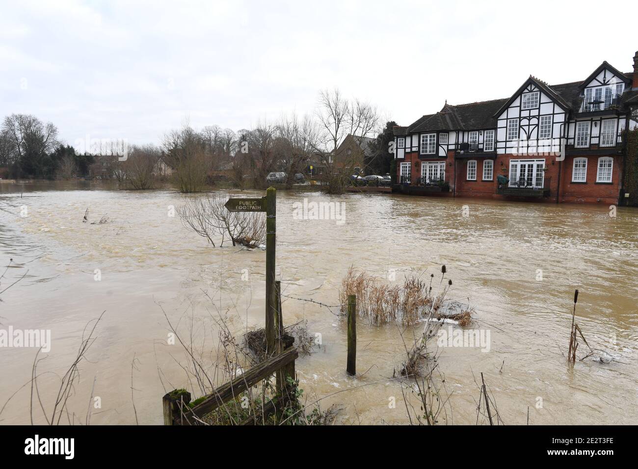 The River Roding after it burst its banks in Abridge, Essex. Heavy snow ...