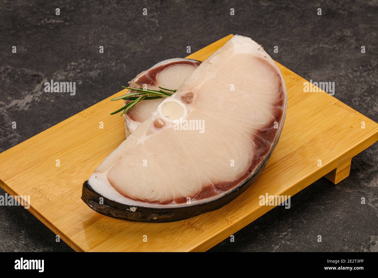 Raw shark steak served rosemary for cooking Stock Photo - Alamy