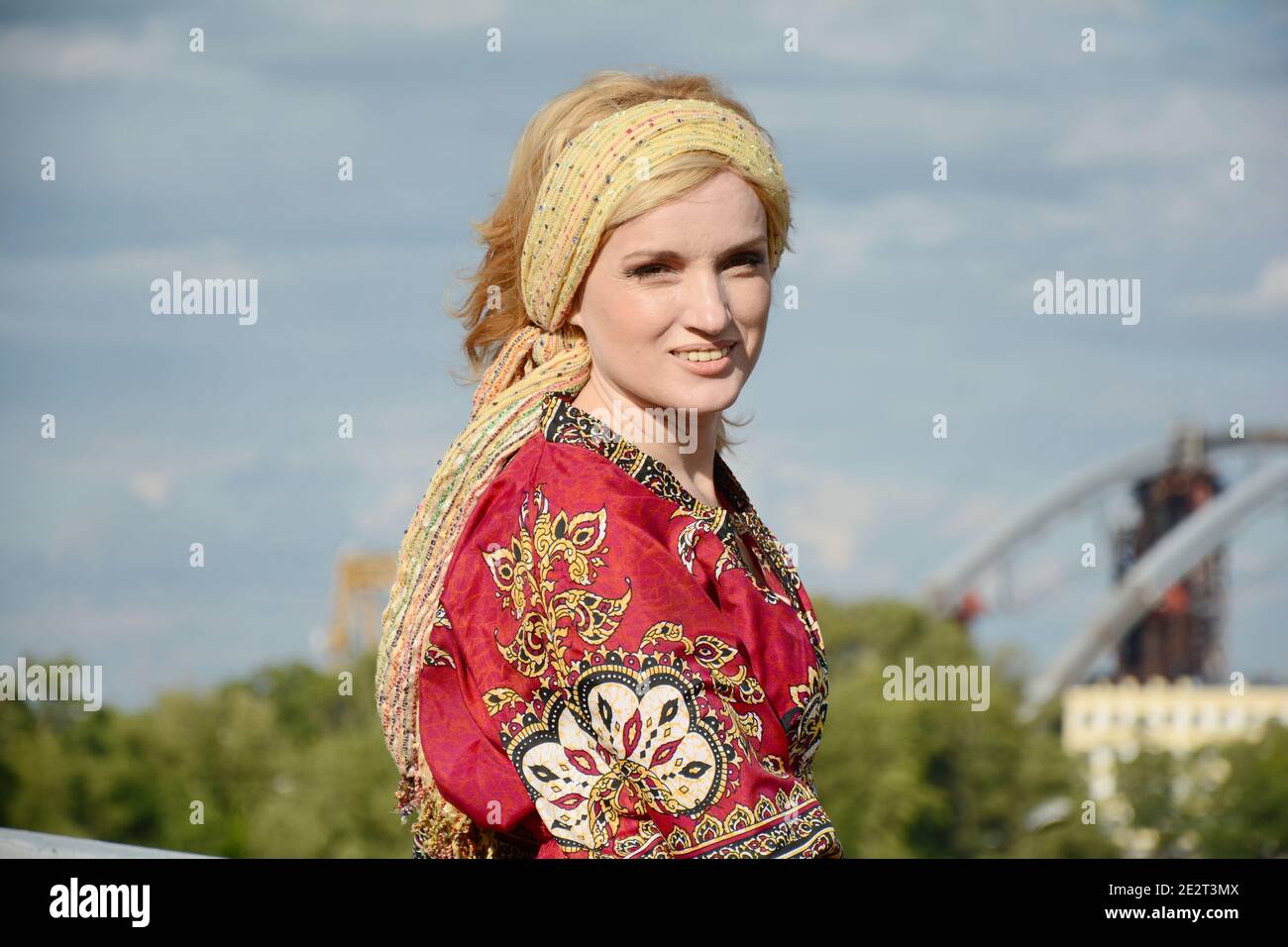 A woman in 1960 hippie style clothes poses outdoors Stock Photo - Alamy