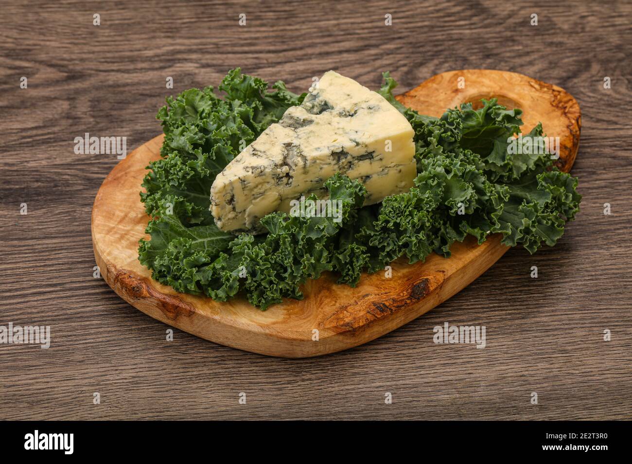 Dairy Blue cheese triangle with mold Stock Photo - Alamy
