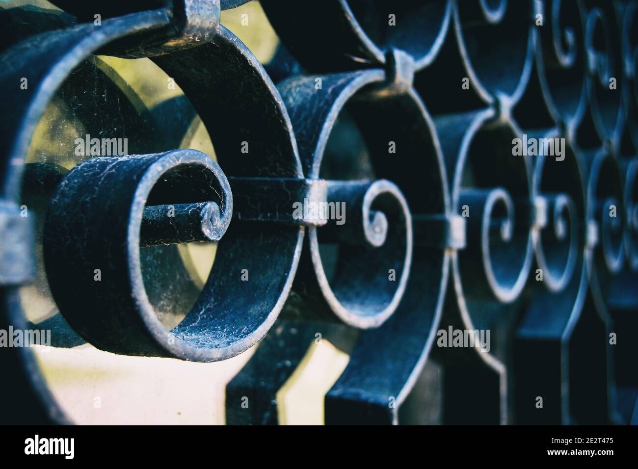 window with a rusty grille with a wrought iron pattern Stock Photo - Alamy
