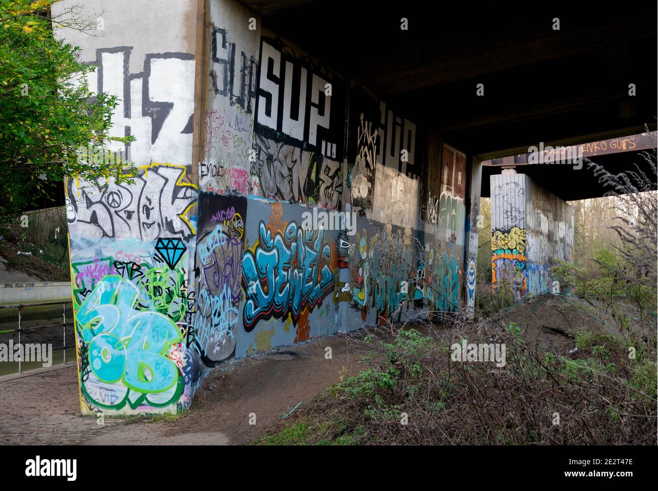 Graffiti bridge, art work sprayed on a bridge Stock Photo - Alamy