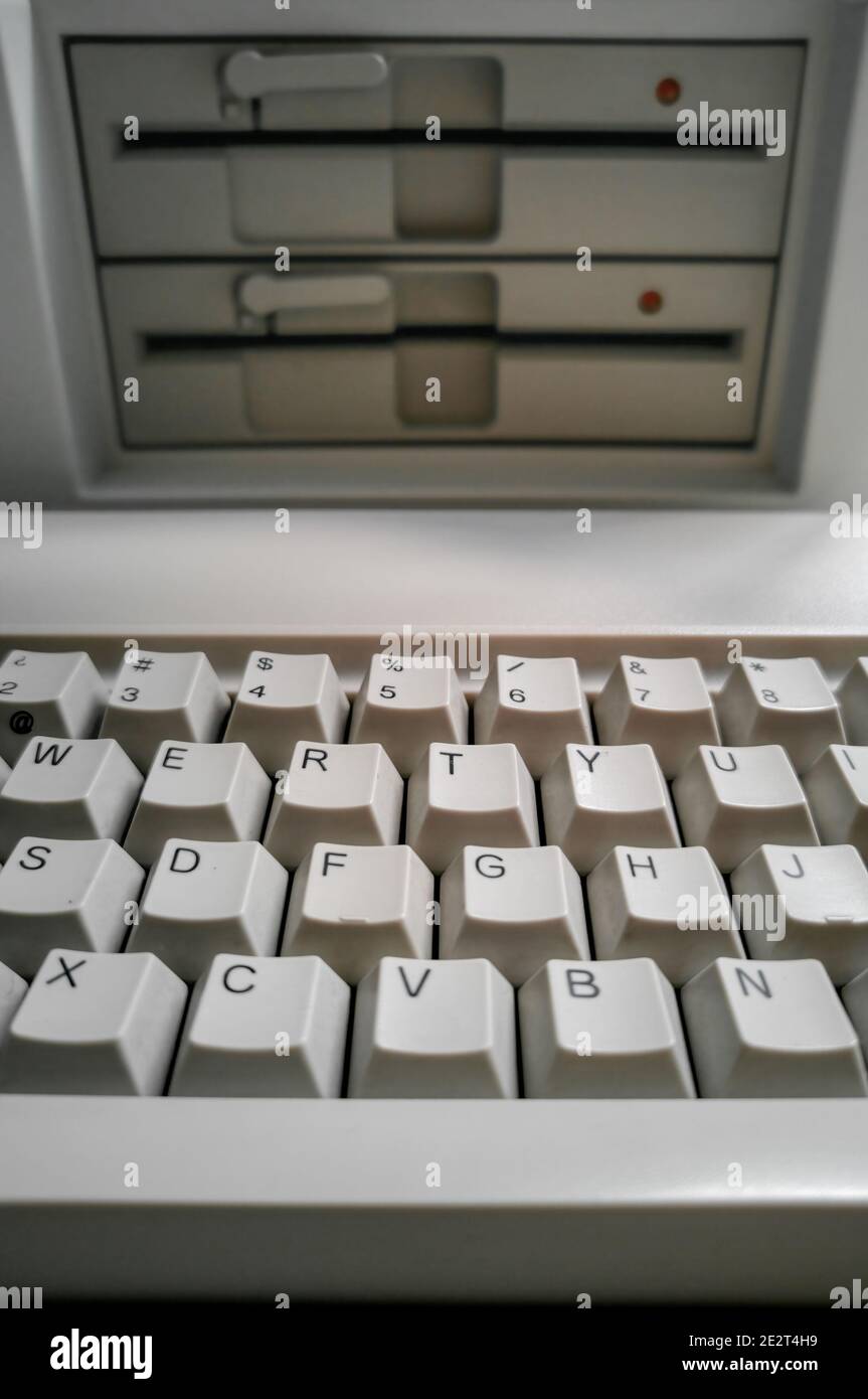 Antique computer keyboard and 5 inch disk drives Stock Photo - Alamy