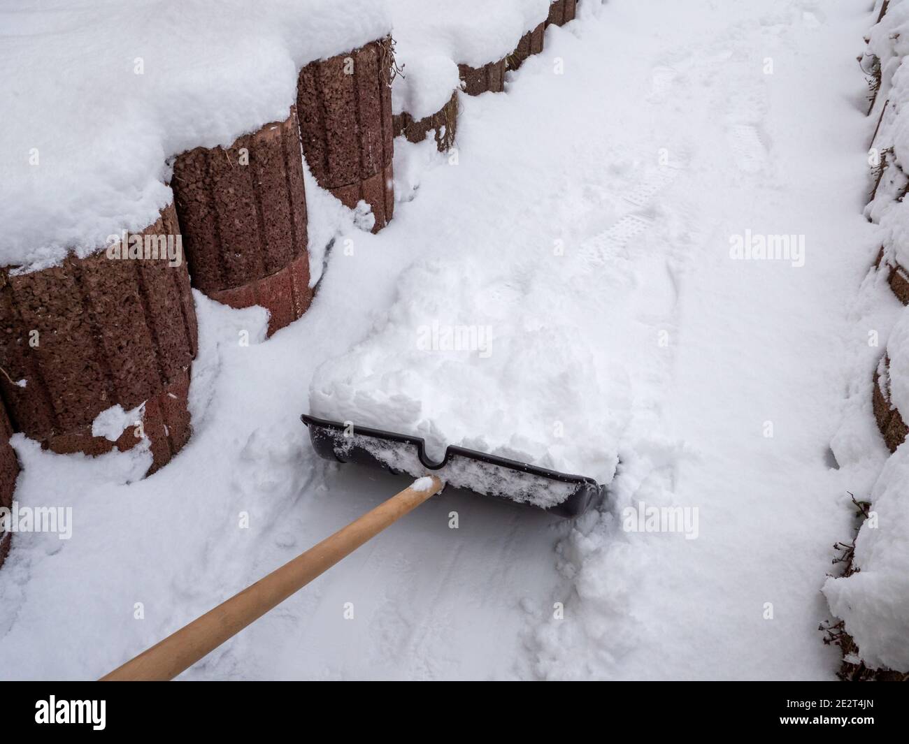 Sidewalk piles of snow hi-res stock photography and images - Alamy
