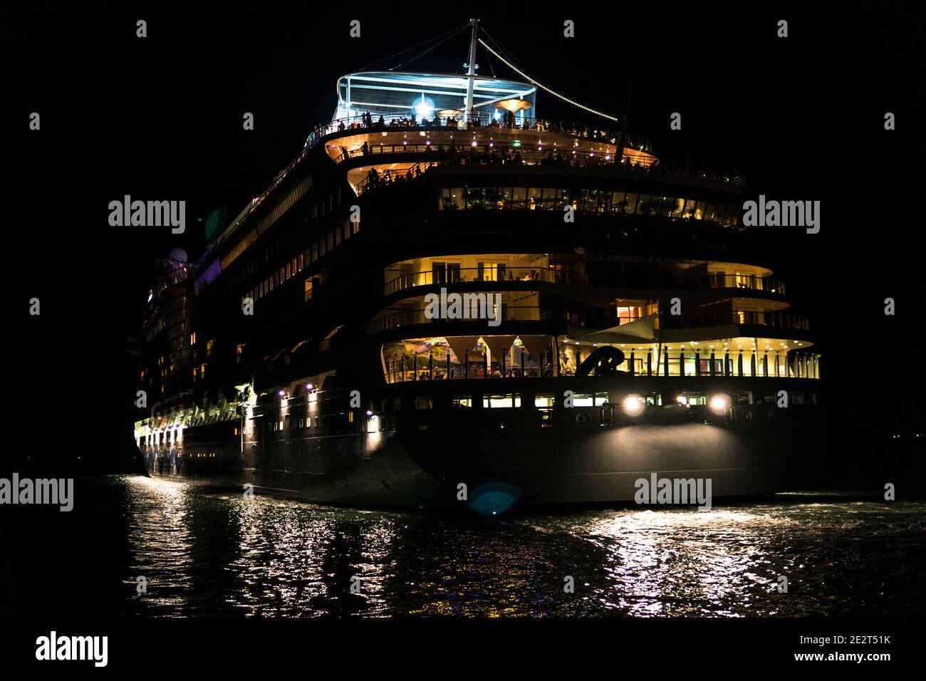 Rear view at night on a giant cruise ship Stock Photo - Alamy
