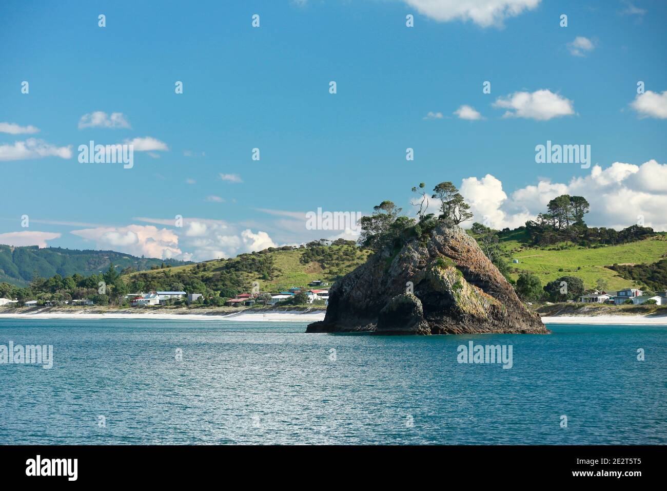 New Zealand, North Island, Waikato: rocky islet in front of Whangapoua ...