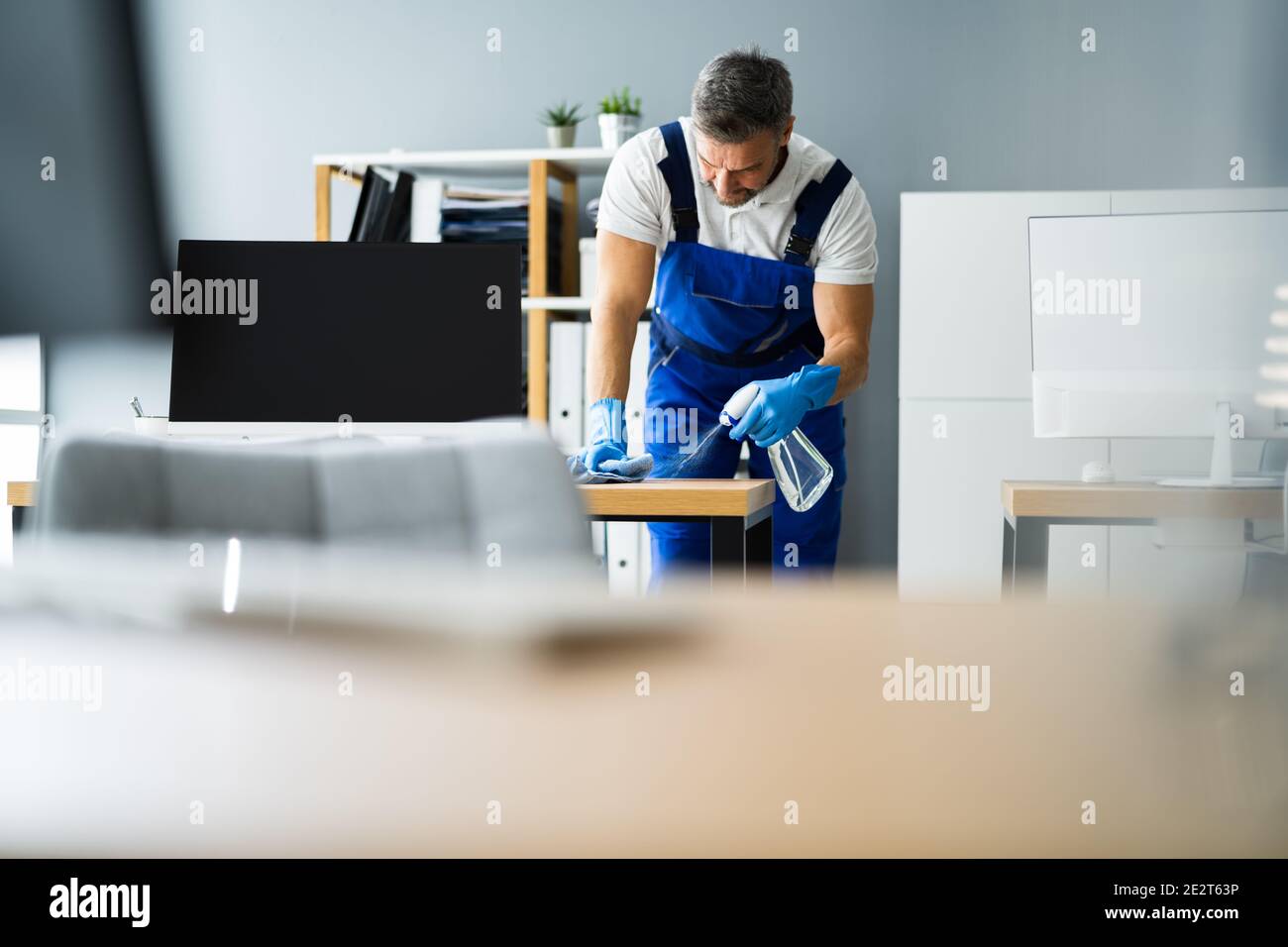 Professional Workplace Janitor Service. Office Desk Cleaning Stock ...