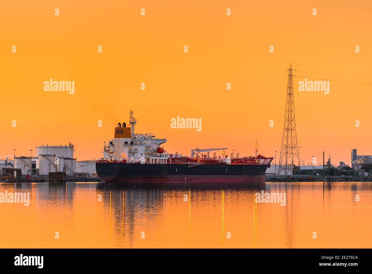 Commercial cargo ship at Port Adelaide docks viewed across Port River ...