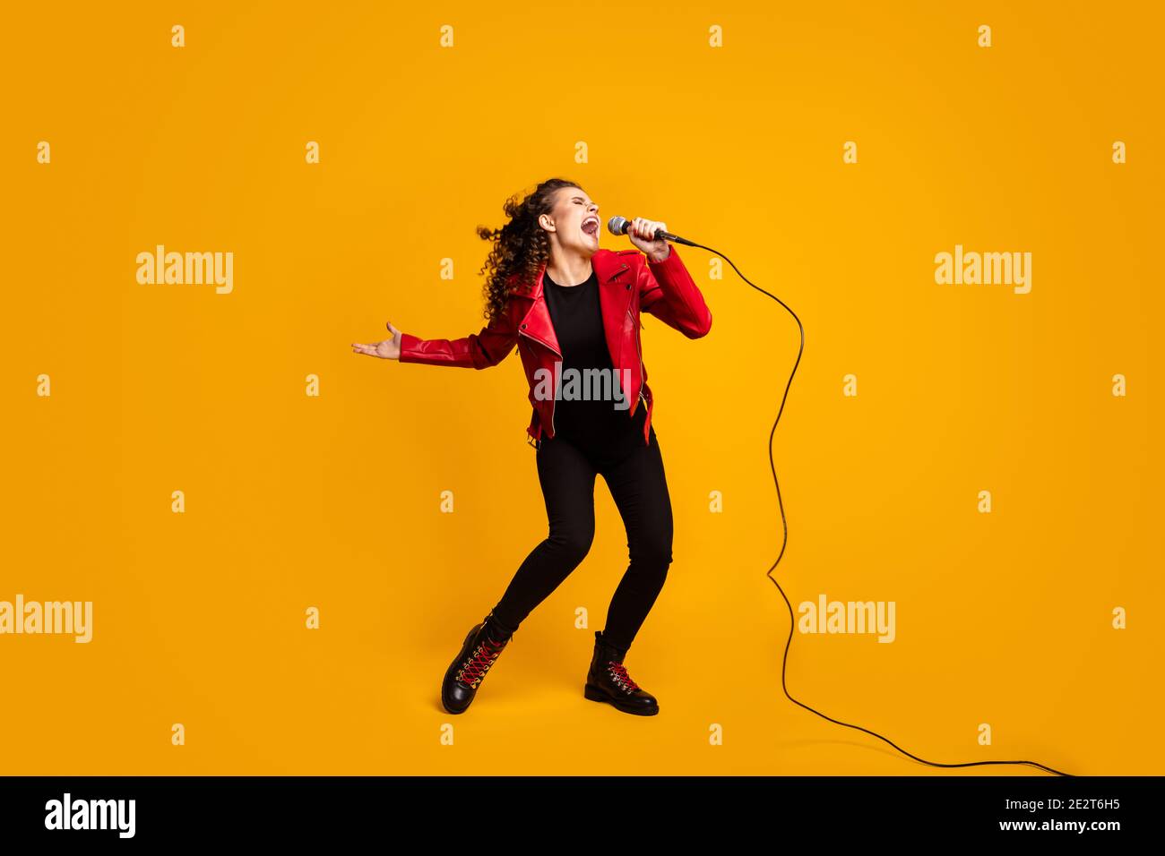 Full length body size view of attractive cheery wavy-haired girl solo ...