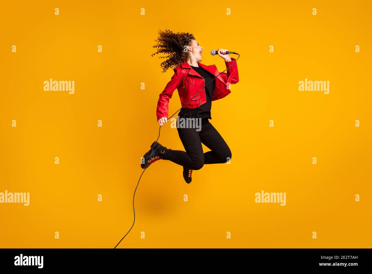 Full length body size view of talented wavy-haired girl soloist ...