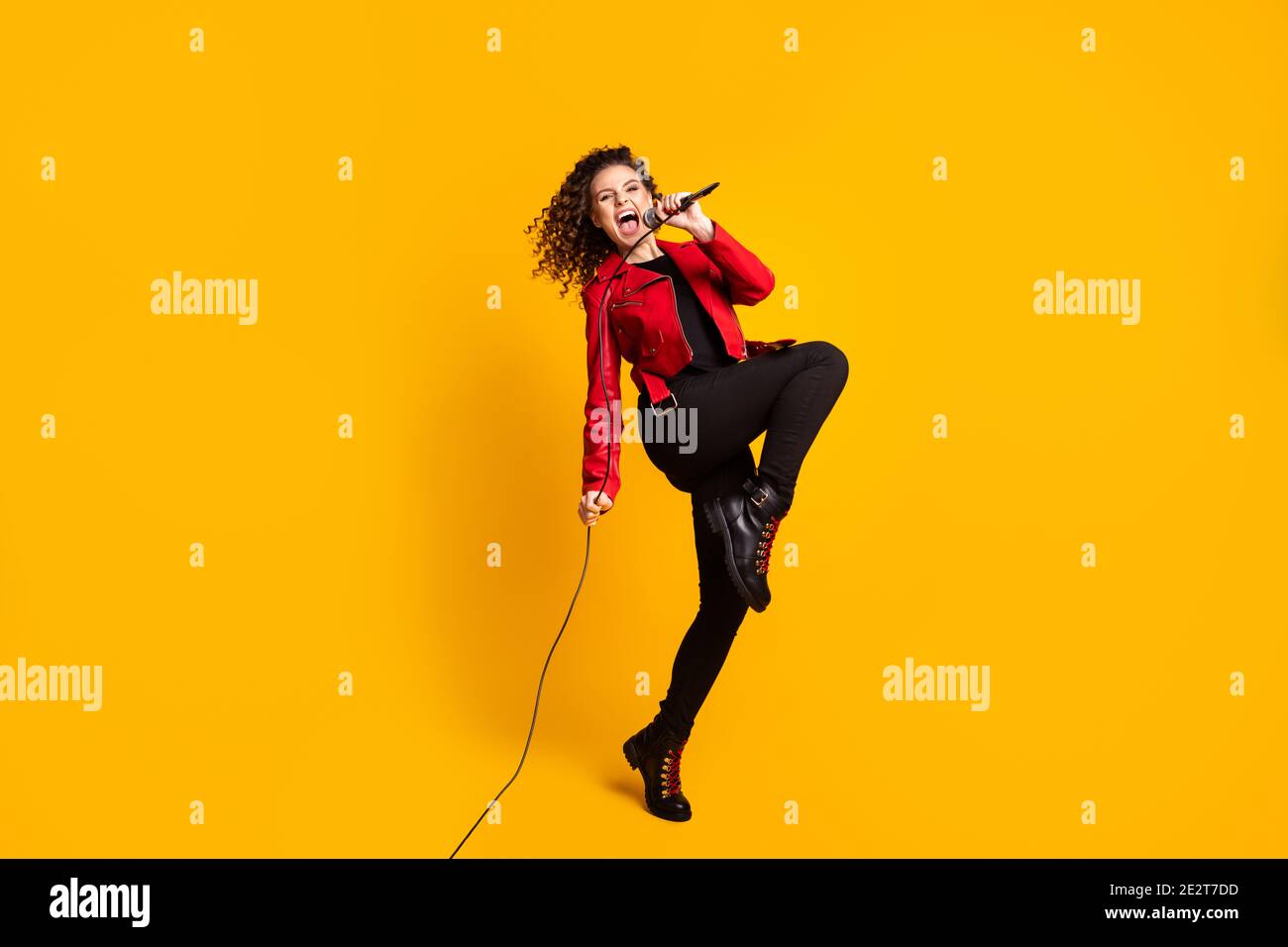 Full length body size view of nice wavy-haired girl vocalist star ...