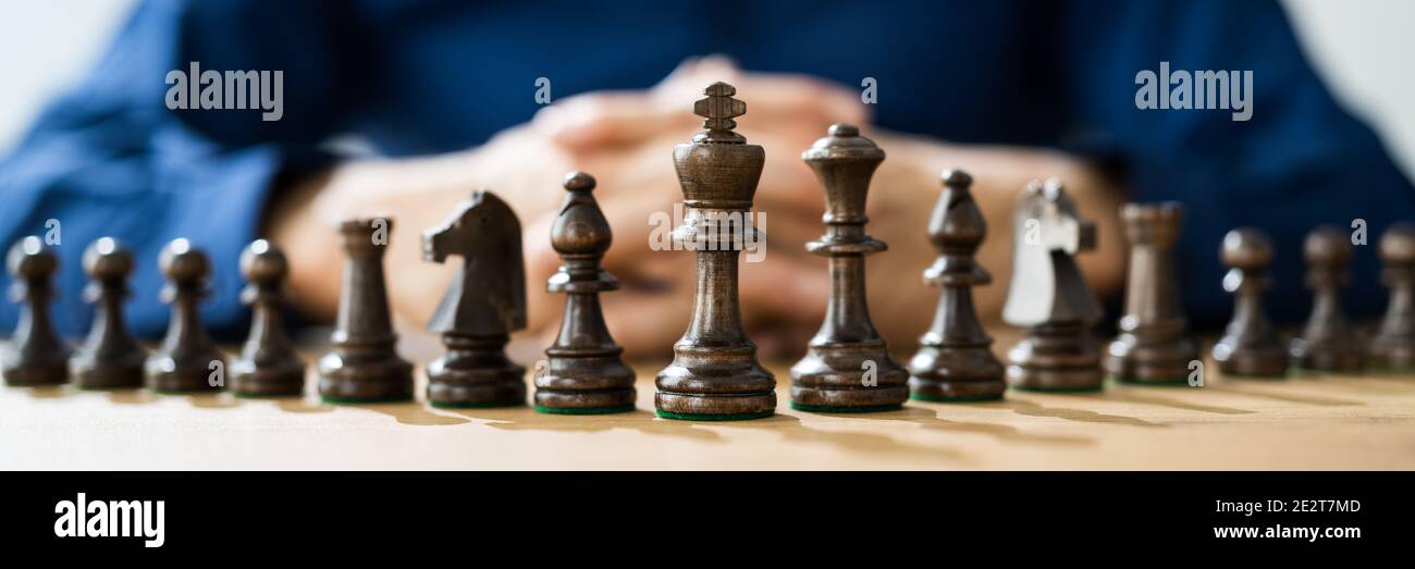 Success Business Strategy. Person With Chess King Stock Photo - Alamy