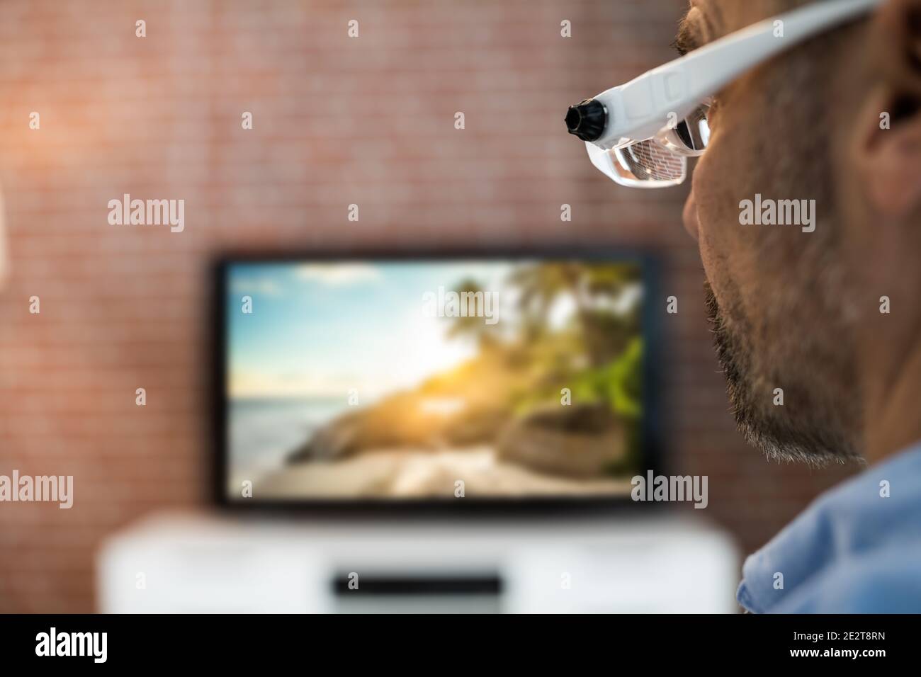 Watching TV Movie In Living Room Using Magnifying Glasses Stock Photo ...