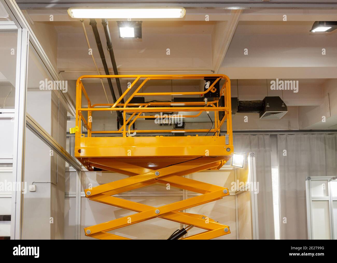 Elevated Work Platform Scissor Lift Inside Building Stock Photo - Alamy