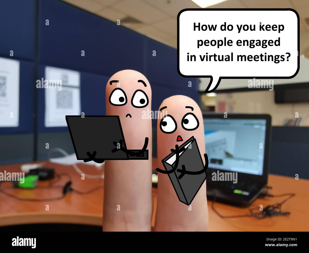 Two fingers are decorated as two person in office. One of them is ...