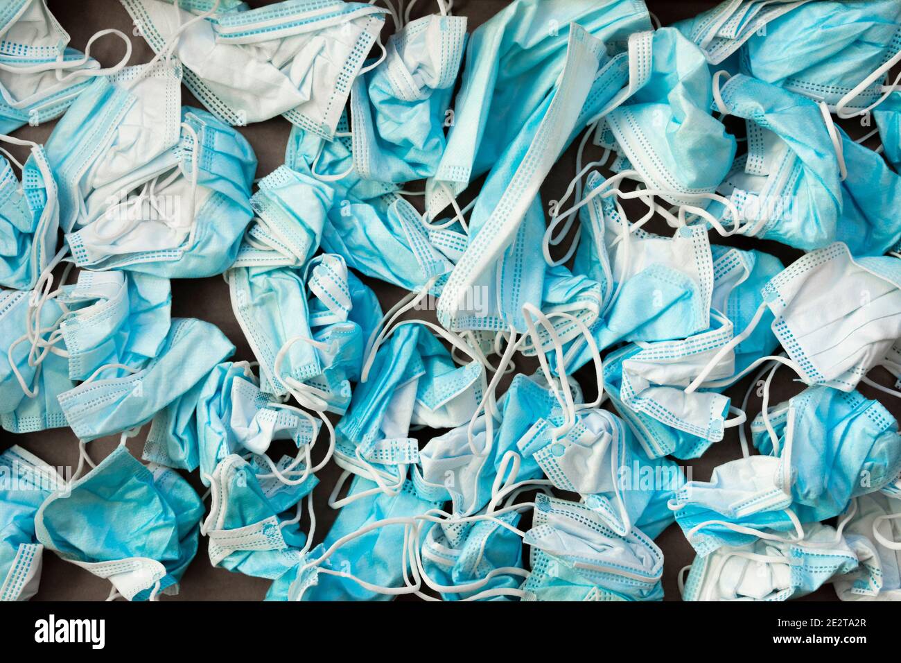 Texture of protective face masks, wrinkled trash, garbage, dirty and ...