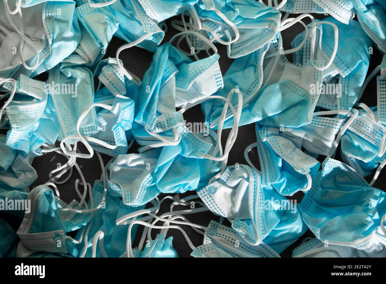 Texture of protective face masks, wrinkled trash, garbage, dirty and ...