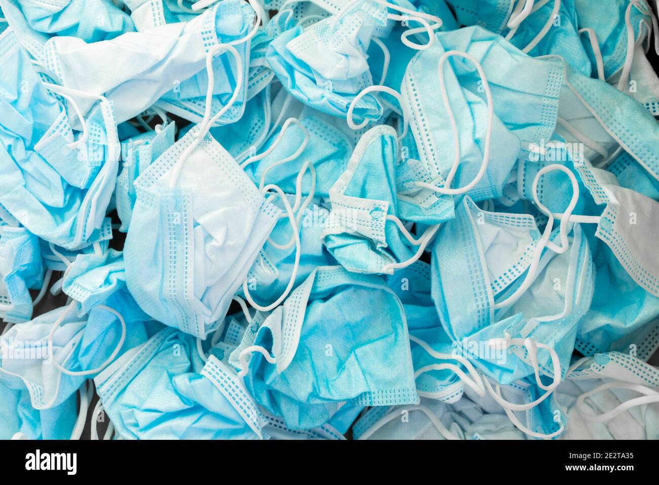 Texture of protective face masks, wrinkled trash, garbage, dirty and ...