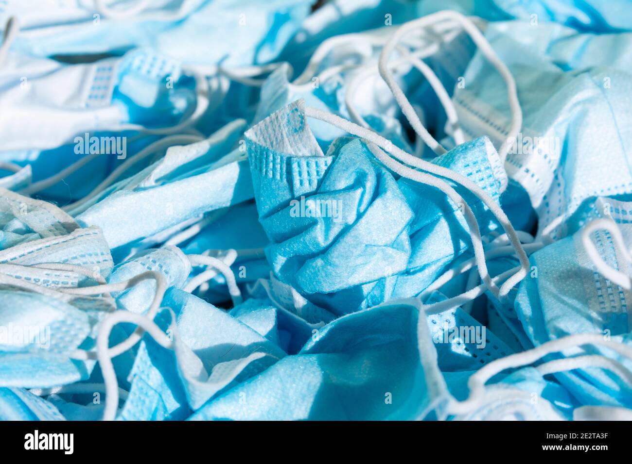 Texture of protective face masks, wrinkled trash, garbage, dirty and ...