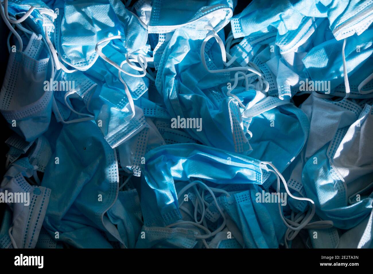 Texture of protective face masks, wrinkled trash, garbage, dirty and ...