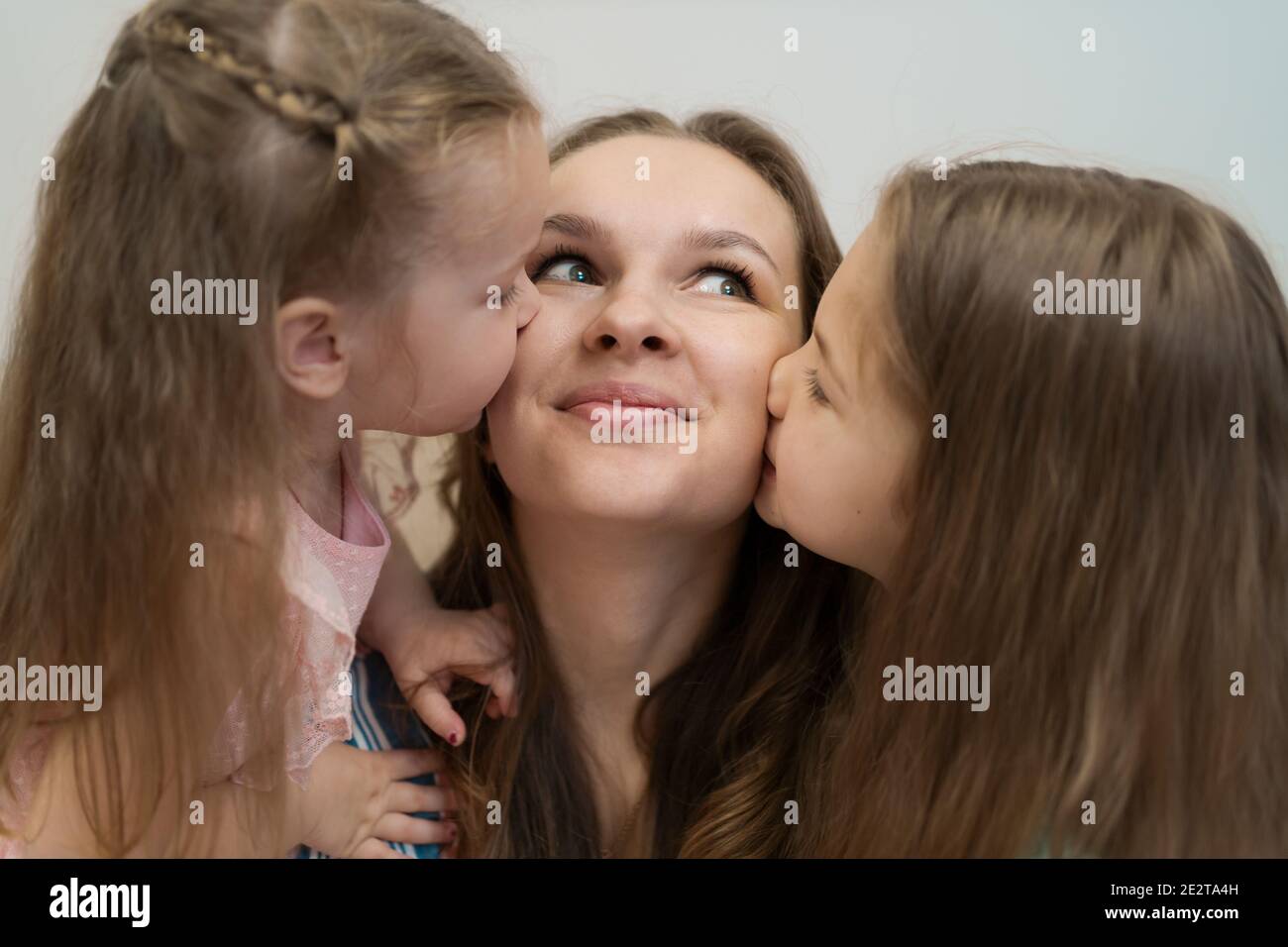 Girl Kissing Mothers Cheek High Resolution Stock Photography and Images ...