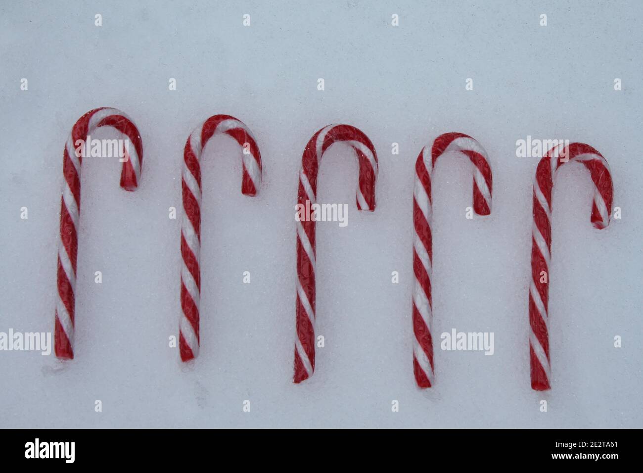 Candy canes lying in the snow hi-res stock photography and images - Alamy